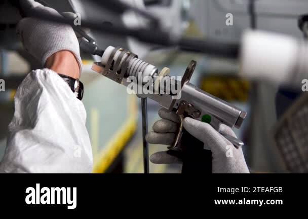 industrial background with the process of painting the car frame. Scene ...