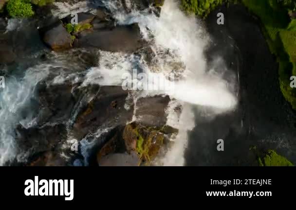 Aerial birds eye overhead top down ascending footage of water stream ...