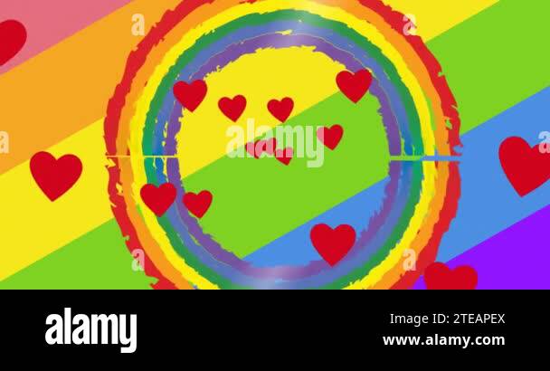 Animation of hearts over rainbow ribbon on rainbow background. pride ...