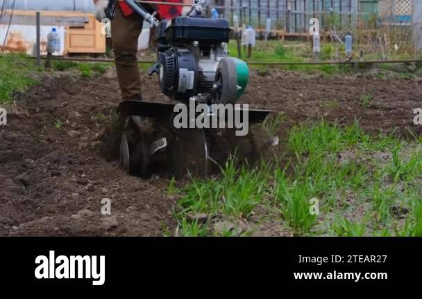 Man plows ground tillerblock Stock Videos & Footage - HD and 4K Video ...