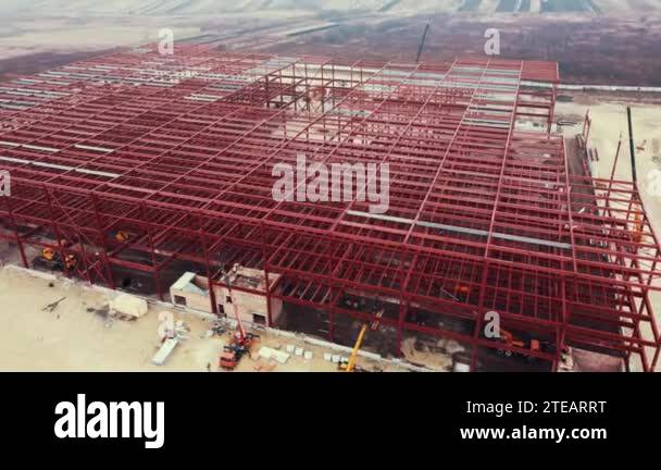 Warehouse Construction from metal structure. Industrial building on ...