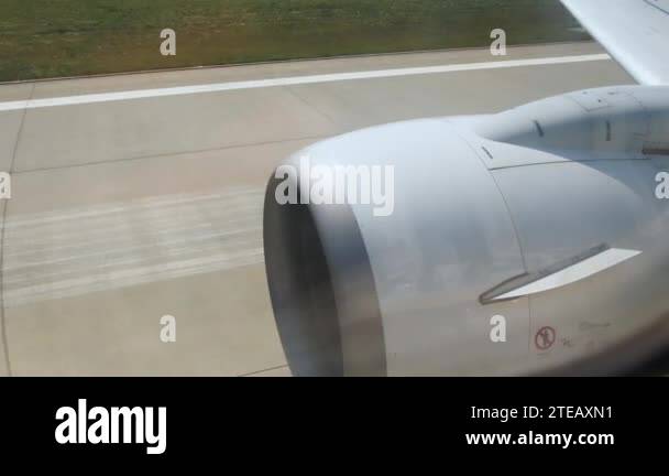 View from the window of a plane moving at the airport. Preparing for ...