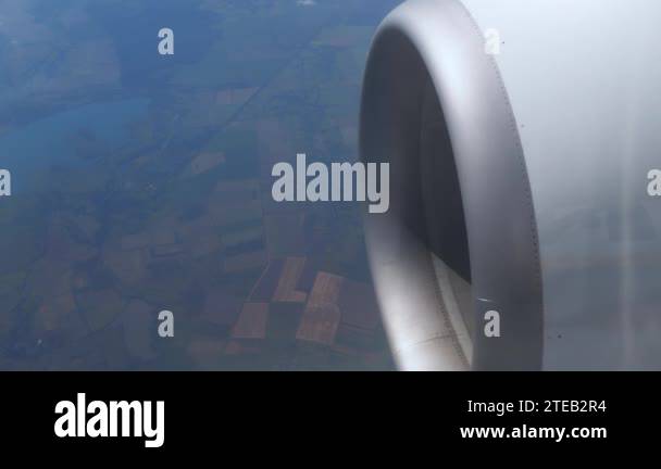 Flying turbine is spinning a motor. Clouds float across sky at high ...