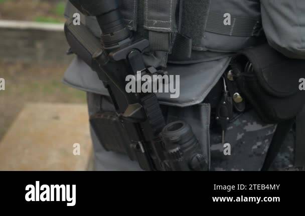 Detail of assault rifle weapon held by a SWAT team officer Stock Video ...