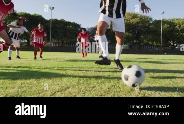 Video of diverse group of male football player on field, playing ...