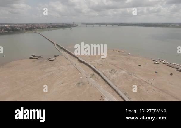 fly downward the Kampong Cham bamboo bridge in Cambodia is the worlds ...