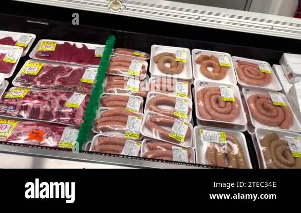 Wrens, Ga USA - 08 08 21: Ingles retail grocery store interior pan pork ...