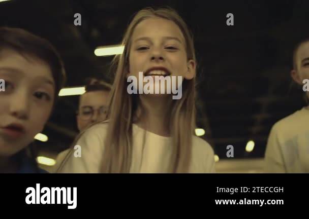 Angry bullies threaten classmate shouting in school corridor close up ...