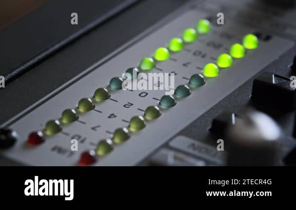 LED indicator of sound level signal on the mixing console. LED strip in ...