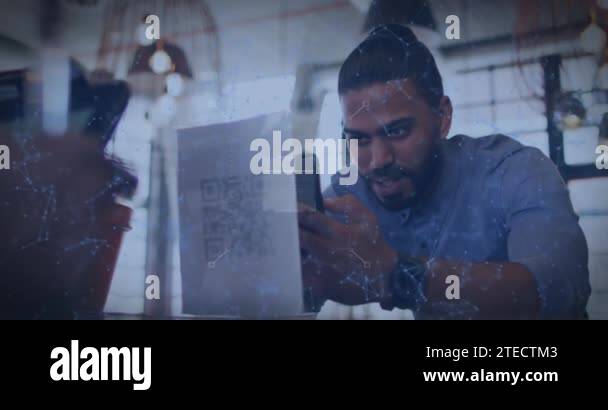 Animation of qr code and digital interface over diverse couple using ...