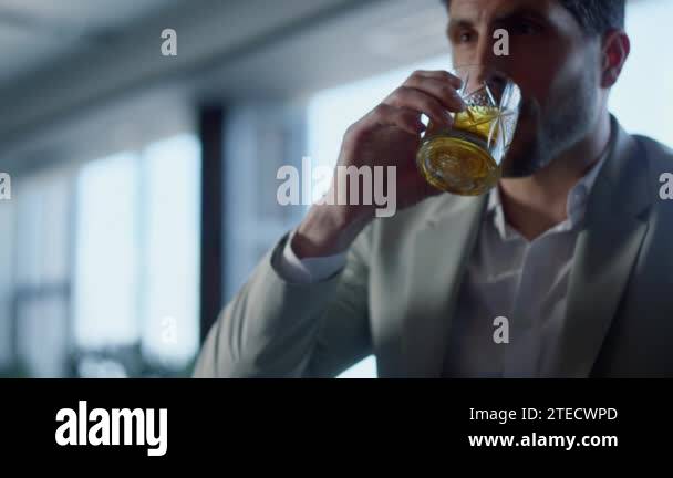 Leader person drinking whiskey in restaurant closeup. Handsome ...