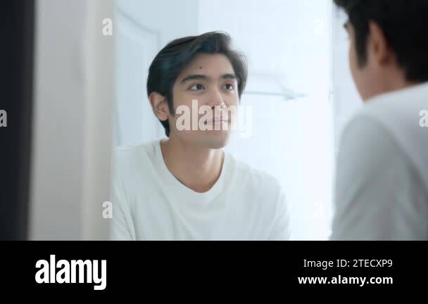Health concept of 4k Resolution. Asian man washing his face with water ...