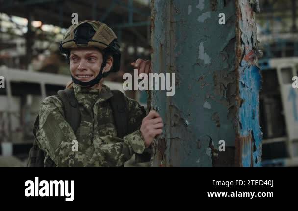 Close up of exhausted female sergeant crying and mourning for fallen ...