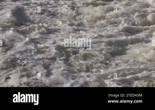 Background of stormy boiling water falling from a great height of the ...