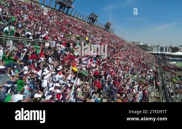 Crowd fans spectators cheering their favorite drivers at the F1 GP ...