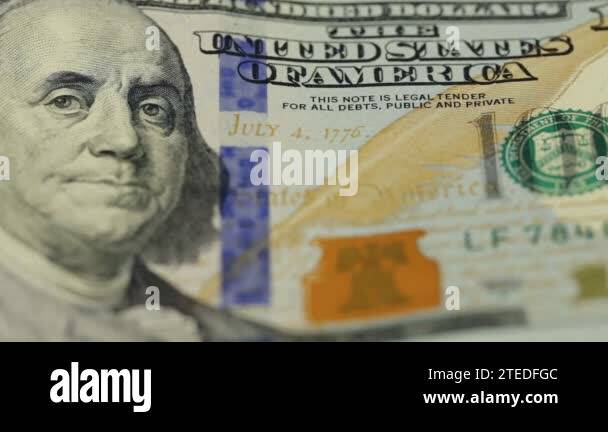 Cash money background. Benjamin Franklin portrait on 100 US dollar bill ...