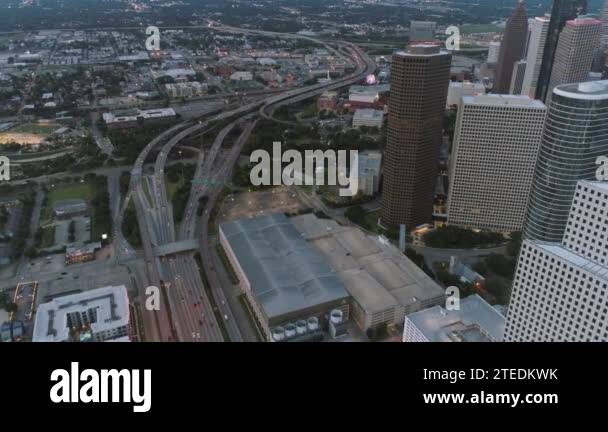 This video is about an aerial of traffic on freeway in downtown Houston ...