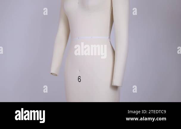 close up of a fabric and metallic vintage dummy dress mannequin ...
