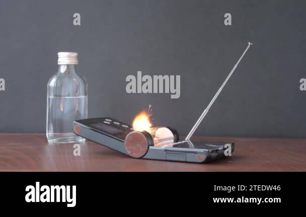 The desktop radio is on fire, sparks are flying, black smoke is coming ...