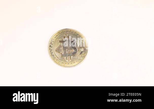 footage of handcuff coin white background Stock Video Footage - Alamy