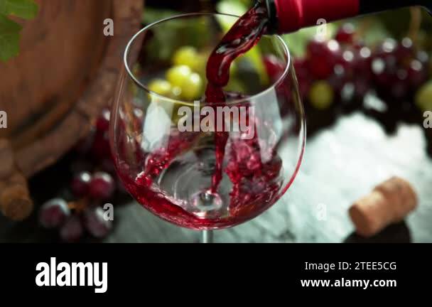 Super Slow Motion of Pouring Red Wine Into Glass. Still Life ...