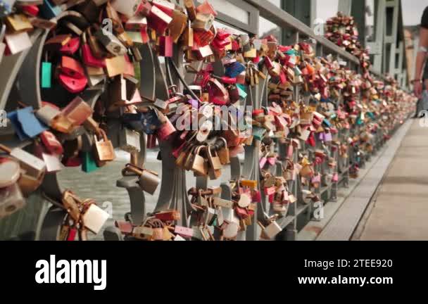 Metal colorful locks with names of bride and groom. Wedding tradition ...