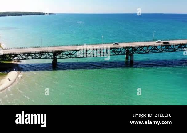 Drone footage of Michigan's great lakes and the Mackinac Bridge in ...
