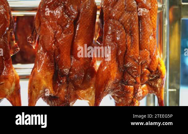 Roast duck display Stock Videos & Footage - HD and 4K Video Clips - Alamy