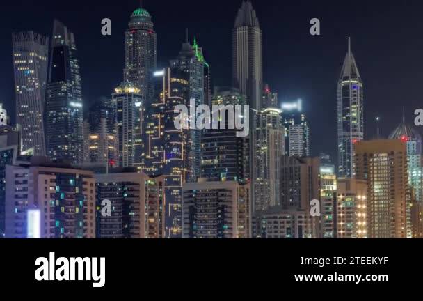 Dubai marina tallest block of skyscrapers during all night timelapse ...