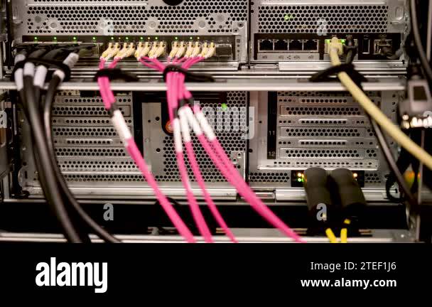 network switch with fiber optic cable in a data center Stock Video ...