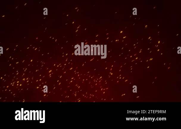 Glowing flying ember, burning ash particles. Hot fire sparks with ...