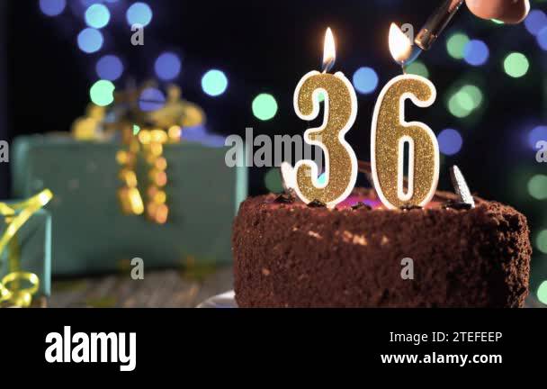 Birthday cake with candles number 36 on a bright festive background ...