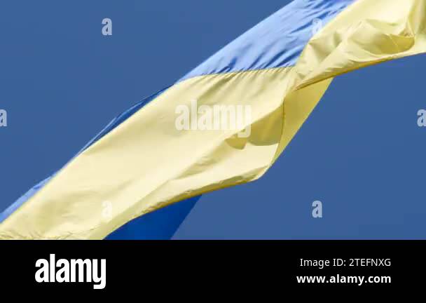 Highly detailed fabric texture flag of Ukraine. Slow motion of Ukraine ...