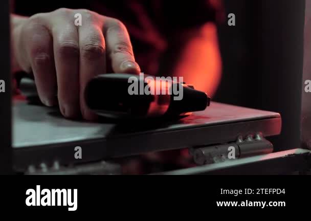 Firearm. Gun safe, gun box. Modern black pistol gun Investigator ...