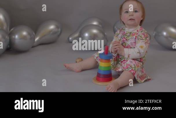 Happy little girl with pyramid clapping hands. Expression emotions in ...
