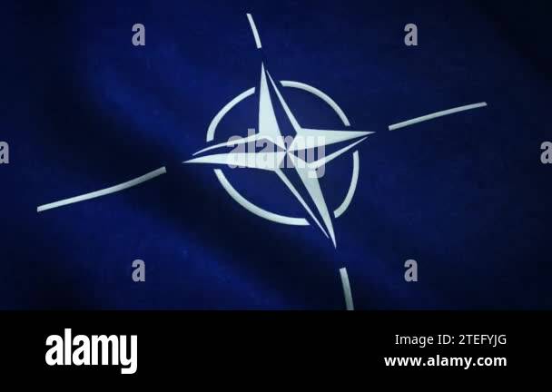 Realistic flag of North Atlantic Treaty Organization NATO waving with ...