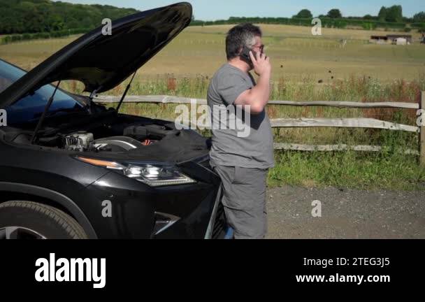 Frustrated Man Repairing Accident Car. Sad Disappointed Male On Broken ...