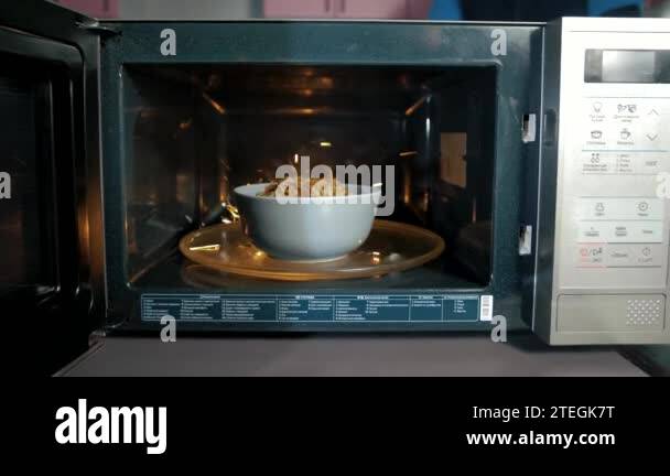 Microwaves cooking Stock Videos & Footage - HD and 4K Video Clips - Alamy