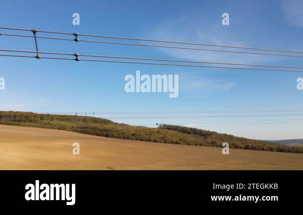 High voltage power line with insulation divider of electric power wires ...