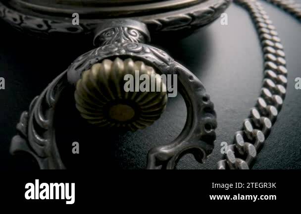 Silver chain and internal working mechanism of an antique pocket watch ...