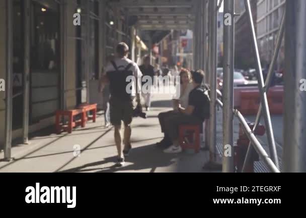 People walking under scaffolding Stock Videos & Footage - HD and 4K ...