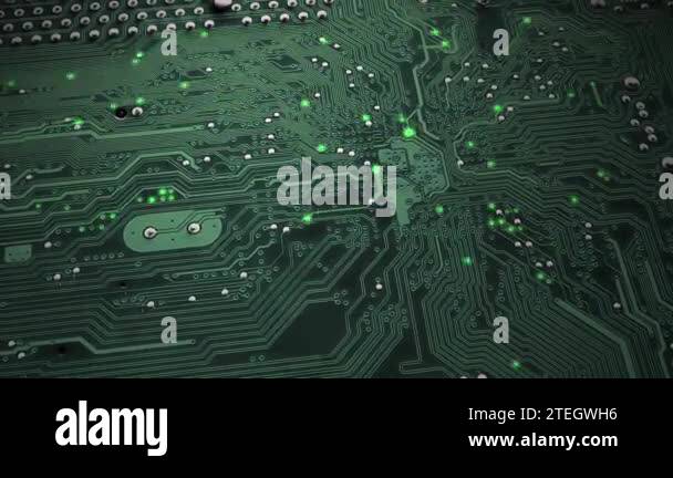 Animation electronic signal move and flash along the surface tracks of the green circuit board ...
