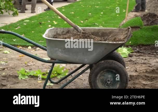 Gardening garden wheelbarrow sand soil Stock Videos & Footage - HD and ...