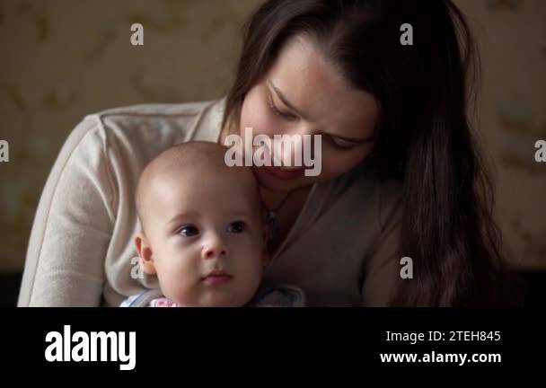 Newborn Active Baby With Young Mom. Cute Smiling Teethless Face ...