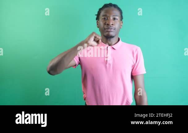 Black man making won sign, man making a win sign making a fist with one ...