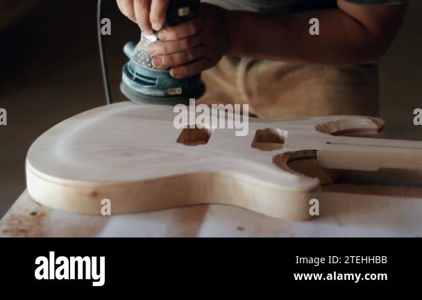Craftsman luthier making a musical instrument Stock Videos & Footage ...