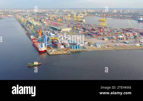 Huge port with floating tug a bay and transport infrastructure with ...