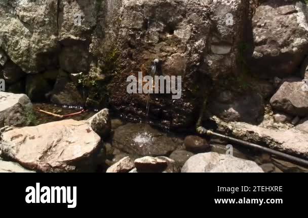 A water system in Batad, free flowing clear natural spring water from a ...