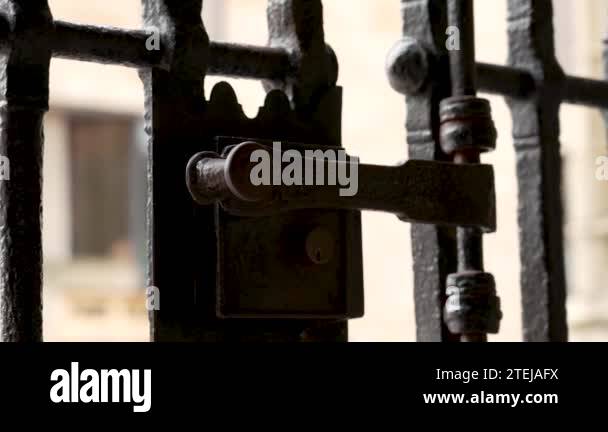 Ancient metal rusty wrought latch with handle deadbolt and lock of ...