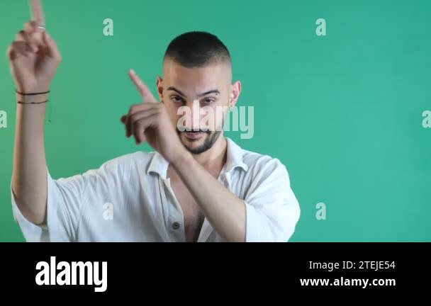 Young Man Pointing To Corner, man pointing right corner with both hands ...